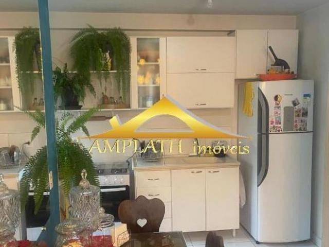 Apartamento 2 dormitórios no Centro de Esteio com 47m², vaga de garagem, piscina e área verde. conta