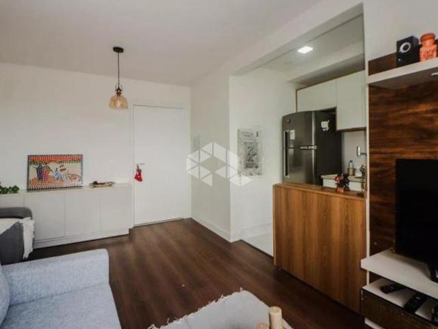 Apartamento 2 dormitórios à venda na Rua Sapê | 55m² | Suíte | Mobiliado | Vaga | Condomínio com inf