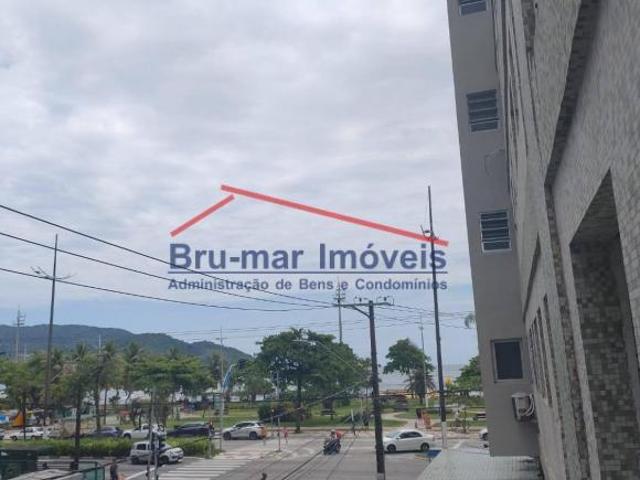 Apartamento 2 dormitórios, Aparecida, prédio frente p/ praia, com sacada
