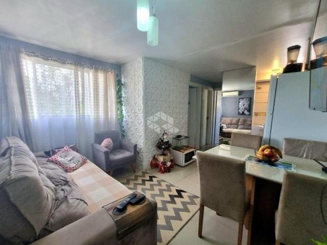 Apartamento 2 dormitórios bairro Olaria com vaga condomínio fechado