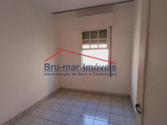 Apartamento 2 dormitórios, Boqueirão, garagem coletiva, quadra da praia