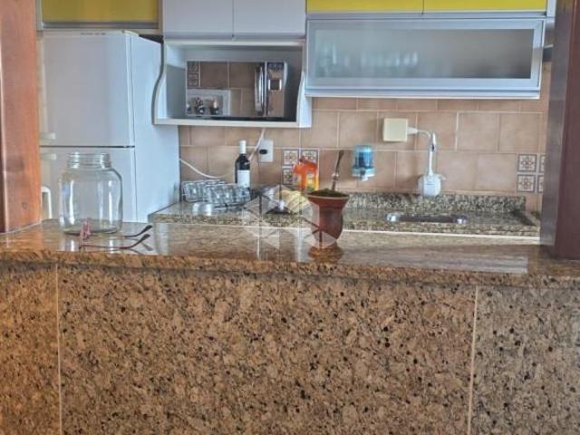 Apartamento 2 dormitórios com 1 vaga no bairro Petrópolis em Porto Alegre/RS