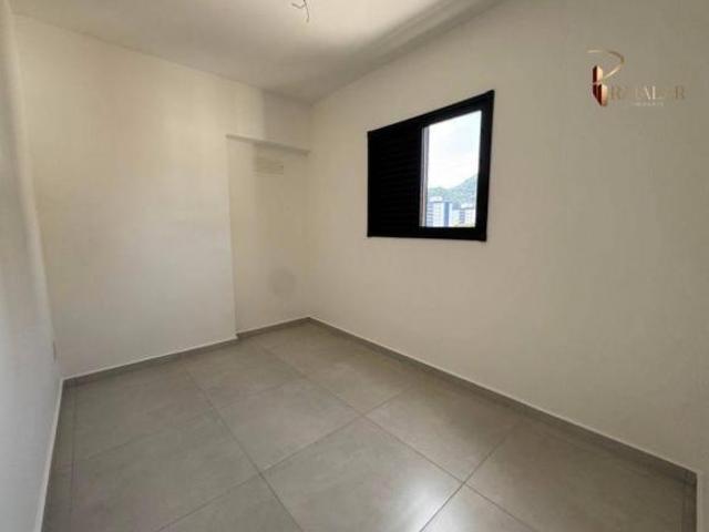 Apartamento 2 dormitórios com 2 suítes com churrasqueira à carvão no canto do forte em Praia Grande