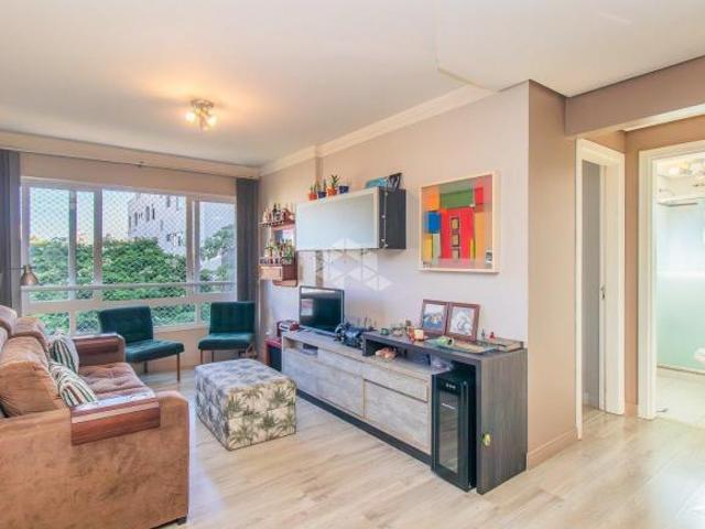 Apartamento 2 dormitórios com 2 vagas de garagem semi mobiliado no Bairro Santa Cecilia em Porto A