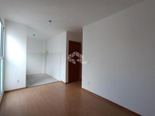 APARTAMENTO 2 DORMITÓRIOS COM VAGA DESCOBERTA ESCRITURADA MORRO SANTANA