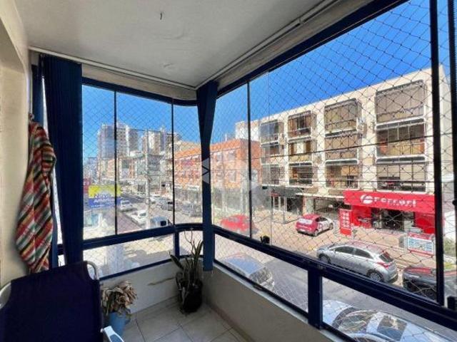 Apartamento 2 dormitórios com box/vaga de garagem no centro de Capão da Capão