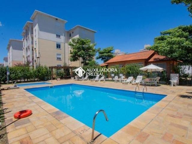 Apartamento 2 dormitórios com sacada e vaga, bairro Humaitá, POA