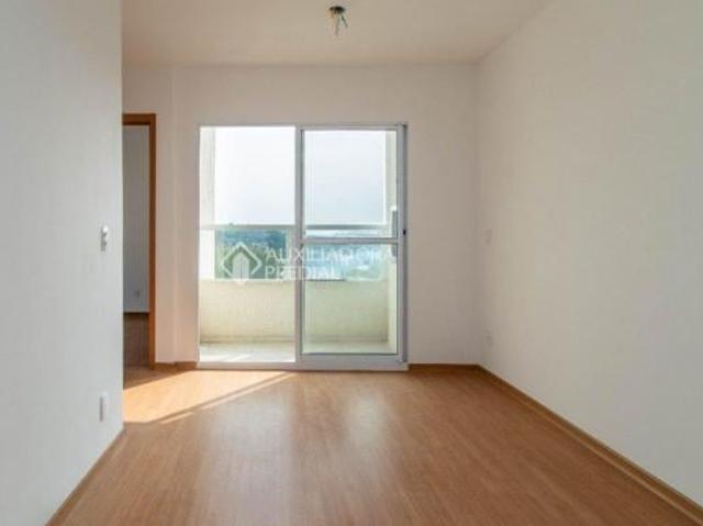 Apartamento 2 dormitórios com sacada e churrasqueira