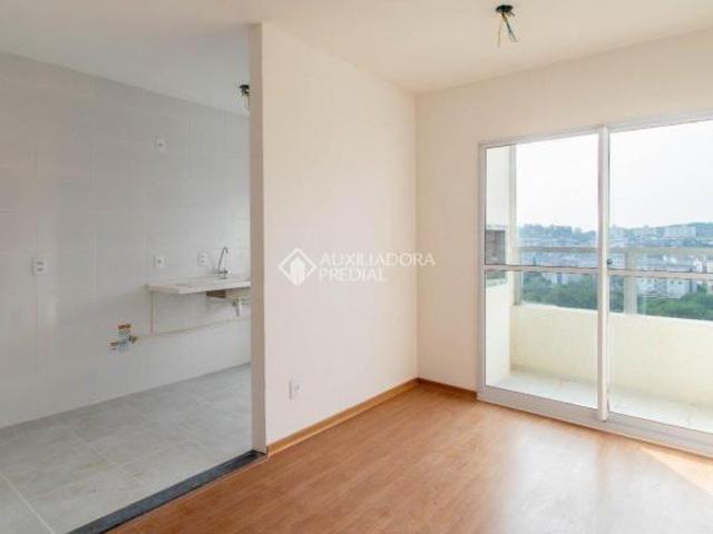 Apartamento 2 dormitórios com sacada e churrasqueira
