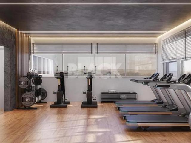 Apartamento 2 dormitórios com sacada no Centro de Torres RS