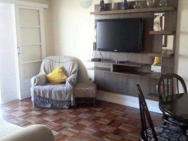 Apartamento 2 dormitórios com sacada, vista para o mar 59m² de área privativa