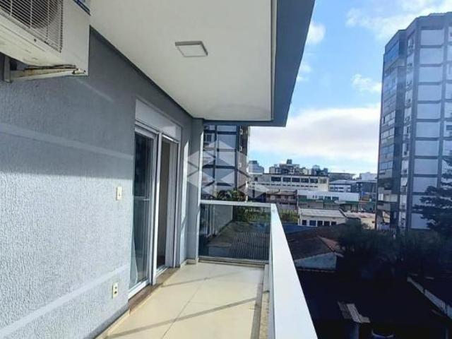 Apartamento 2 dormitórios com suíte 79m² vaga coberta Rua Guilherme Morsch Centro Canoas