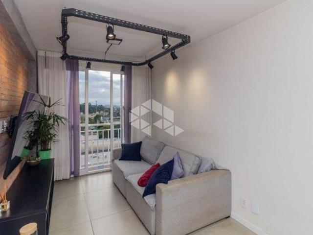 Apartamento 2 dormitórios com suíte churrasqueira na cozinha vaga de garagemm no condomínio Barr