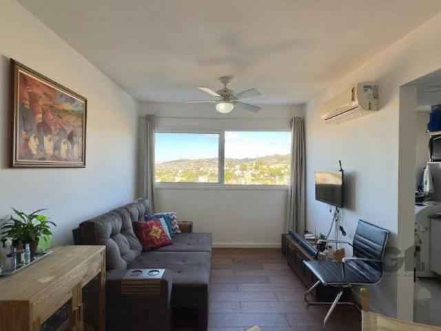 APARTAMENTO 2 DORMITÓRIOS COM SUÍTE E VAGA DE GARAGEM PRÓXIMO À PUCRS