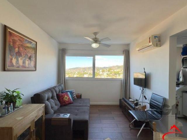 APARTAMENTO 2 DORMITÓRIOS COM SUÍTE E VAGA DE GARAGEM PRÓXIMO À PUCRS