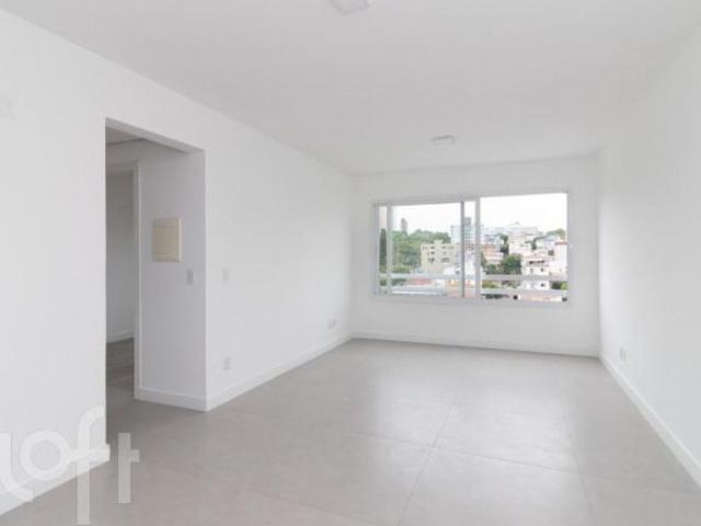 Apartamento 2 dormitórios com suíte Elevador e Garagem