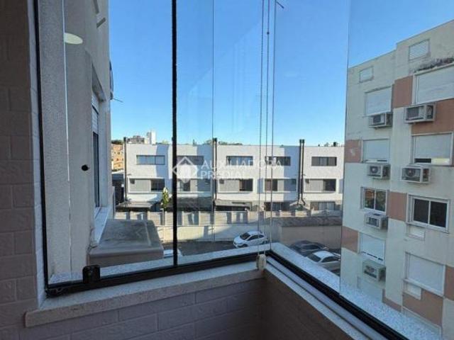Apartamento 2 dormitorios com suite, sacada e churrasqueirra