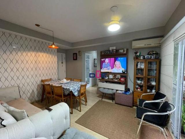 Apartamento 2 dormitórios com suíte, sacada integrada, 1 vaga, no José Menino, Santos