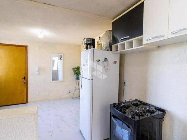 APARTAMENTO 2 DORMITÓRIOS E 1 VAGA DE GARAGEM PRONTO PARA MORAR NO BAIRRO VILA NOVA