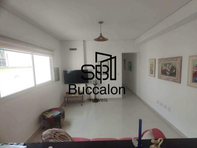 APARTAMENTO 2 DORMITÓRIOS EM PRÉDIO FRENTE AO MAR COM VISTA LATERAL GARAGEM