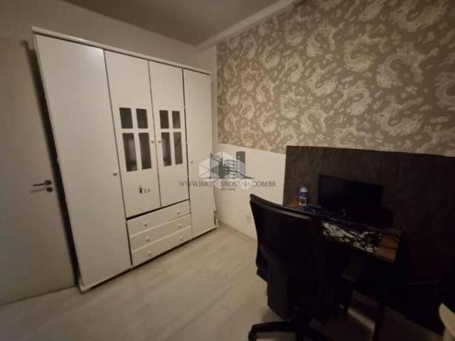 Apartamento 2 dormitórios, garagem no Edifício Rossi
