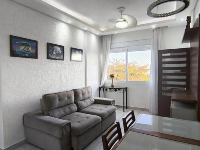 Apartamento 2 dormitórios reformado com vista para o Mar no Embaré em Santos