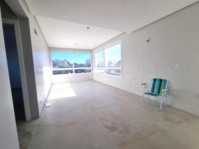 Apartamento 2 dormitórios suíte churrasqueira 2 vagas garagem Novo