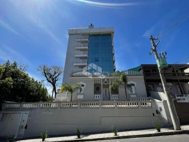 apartamento 2 dormitórios, suíte, com garagem, no centro