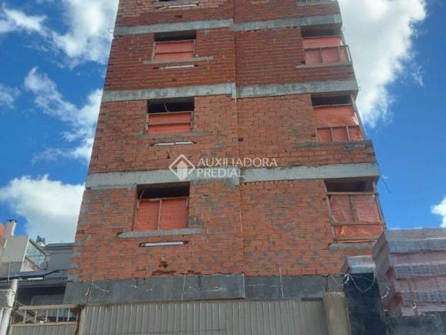 Apartamento 2 dormitórios, suíte e garagem no Jardim Botanico