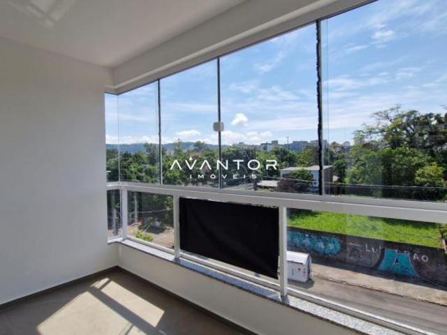 Apartamento 2 dormitórios, suíte, sacada com churrasqueira, frente