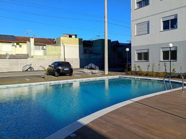 Apartamento 2 dormitórios sacada e churrasqueira Condomínio Igara Club Canoas RS