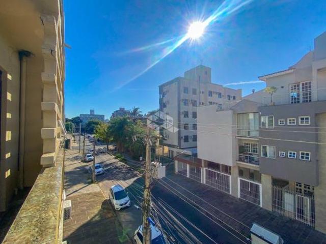 Apartamento 2 dormitórios, sacada frontal, sol norte, 60 m², bairro Petrópolis, Porto Alegre