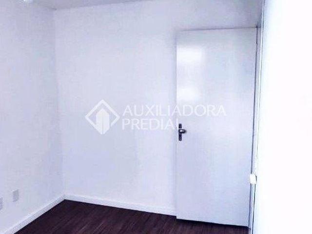 Apartamento 2 dormitórios, sala, cozinha, área de serviço, 1 banheiro, 1 vaga de garagem