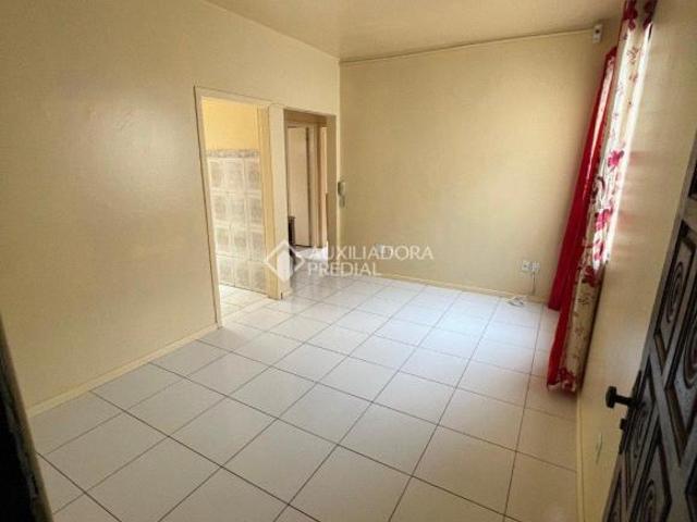 Apartamento 2 dormitorios semi mobiliado, com uma excelente localização