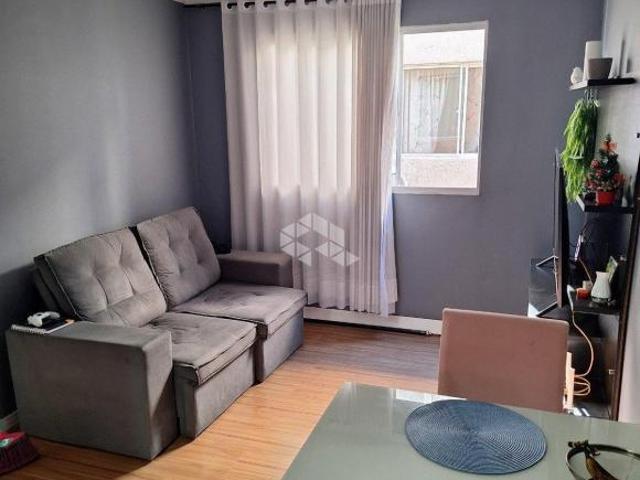 Apartamento 2 Dormitórios SEMI MOBILIADO, 1 vaga rotariva, Bairro Rio Branco Canoas