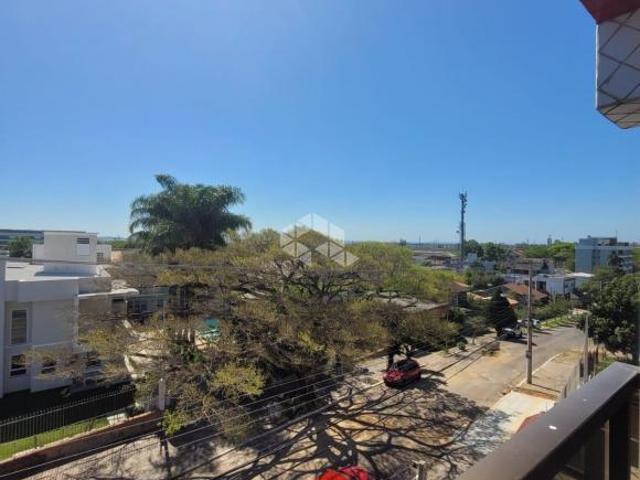 Apartamento 2 dormitórios, sendo 1 suíte, 72m², com sacada e 1 vaga coberta, Bairro Igara Canoas