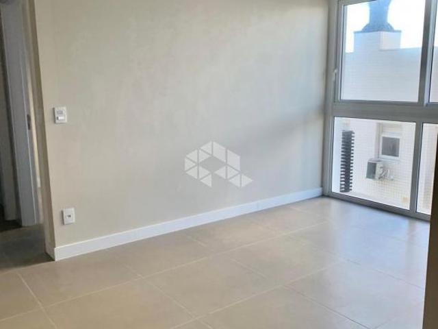 Apartamento 2 dormitórios, sendo 1 suíte, banho social, nunca habitado, prédio c