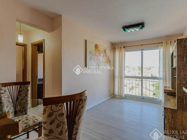 Apartamento 2 Dormitórios, sendo 1 suíte, garagem coberta