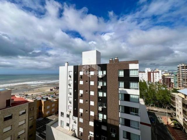 Apartamento 2 dormitórios sendo 1 suíte, mobiliado e decorado, 2 vagas de garagem na Zona Nova em