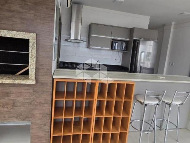 Apartamento 2 dormitórios, sendo 1 suíte, semi mobiliado, ótima posição solar no
