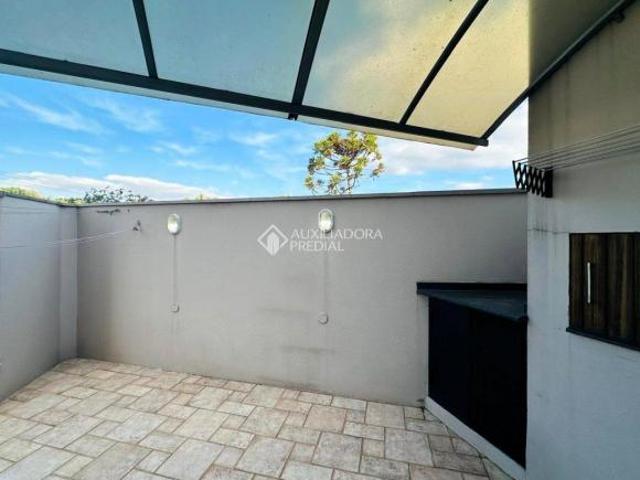 Apartamento 2 dormitórios, terraço com churrasqueira, com vaga de garagem coberta