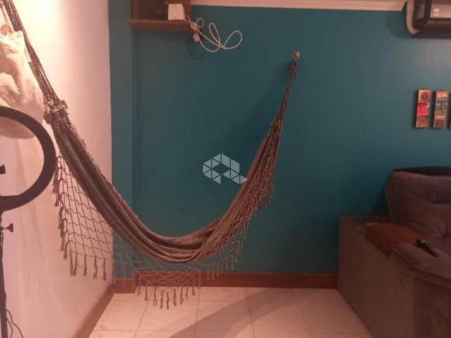 APARTAMENTO 2 DORMITÓRIOS TÉRREO COM 2 VAGAS NO JARDIM BOTÂNICO