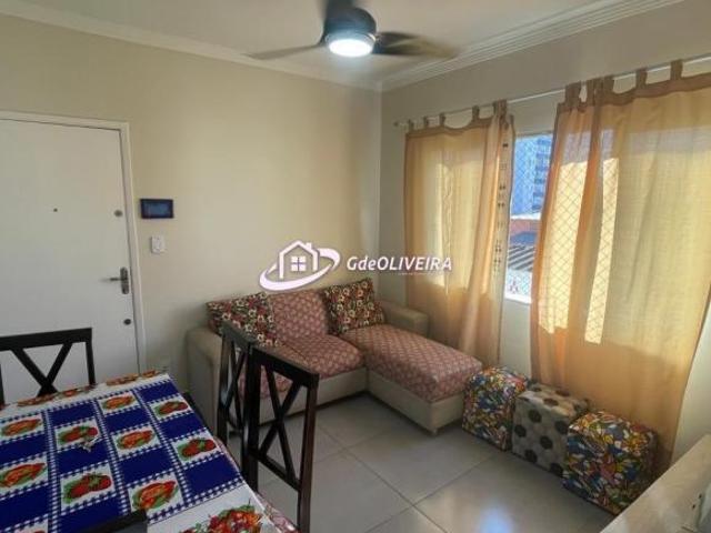 APARTAMENTO 2 DORMITÓRIOS 1 SUITE 2 VAGAS DEMARCADAS NA PRAIA GRANDE LADO PRAIA