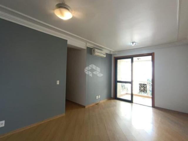 APARTAMENTO 2 DORMITÓRIOS 1 SUÍTE COM CHURRASQUEIRA E VAGA COBERTA PASSO DA AREIA