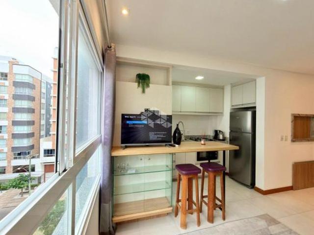 Apartamento 2 dormitórios 1 suíte mobiliado com vaga de garagem na Zona Nova de Capão da Canoa!