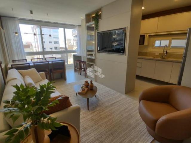 Apartamento 2 dormitórios 1 suíte mobiliado com box/vaga de garagem na Zona Nova em Capão da Canoa