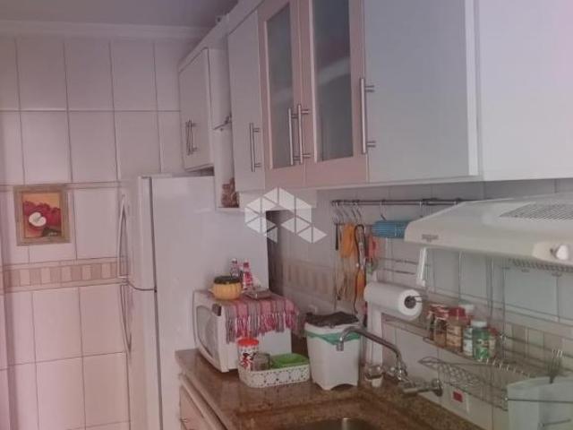 Apartamento 2 dormitórios, 1 suíte, mobiliado, sacada, box de garagem, Zona Nova, em Capão da Canoa