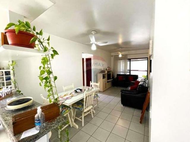 Apartamento 2 Dormitórios 1 suíte Sala com sacada Cozinha americana de costas p/ mar Piscina Salão