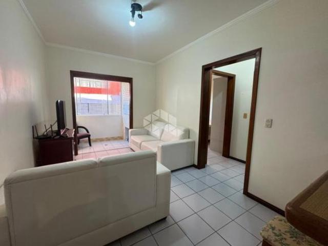Apartamento 2 dormitórios, 2 banheiros, sacada com churrasqueira, no Centro próx