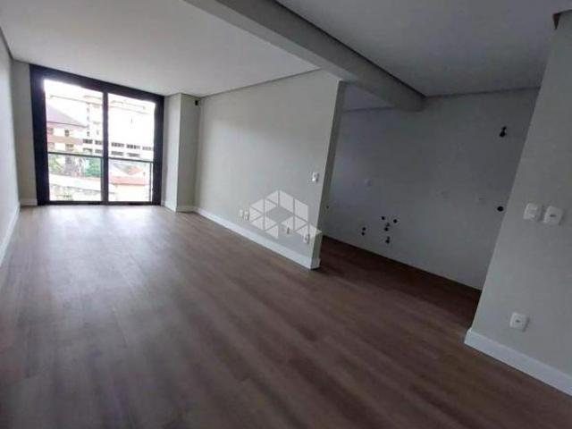 Apartamento 2 dormitórios, 2 suites e 1 vaga de garagem no Centro de Gramado junto a Av. Borges de M